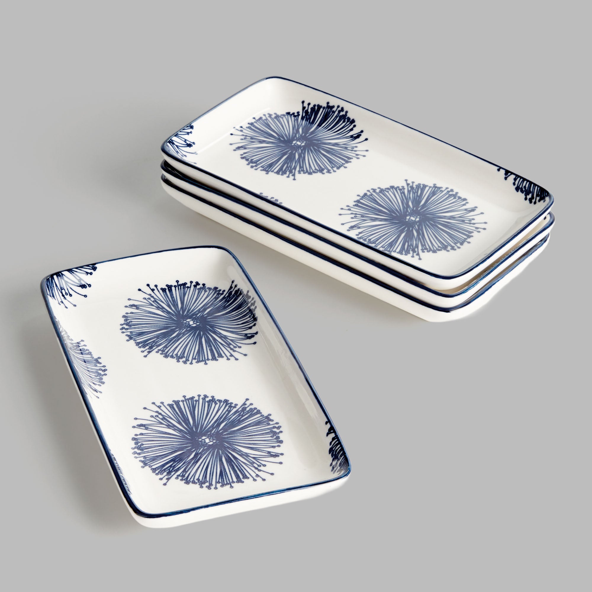 dark blue starburst 8" ceramic trays (set of 4) | parker + gibbs